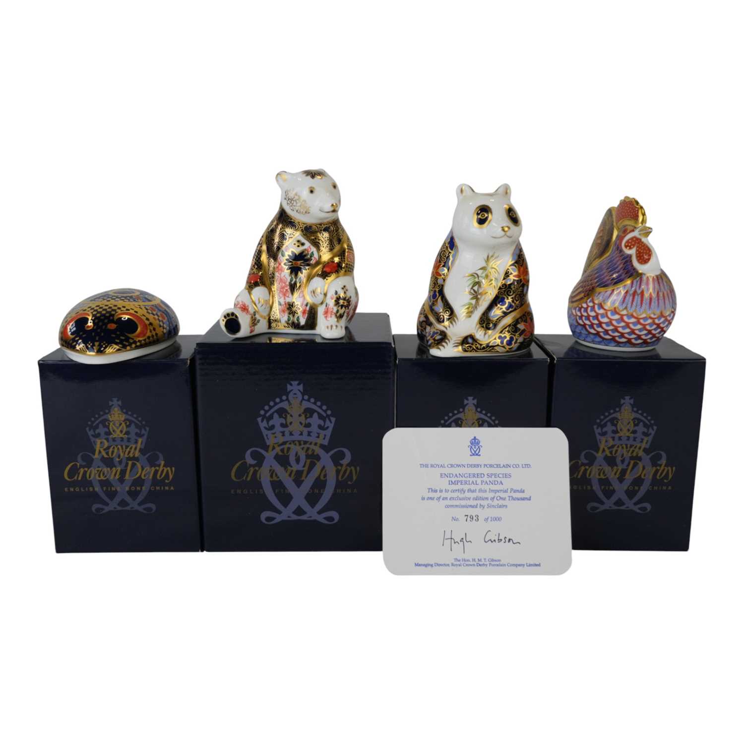 Lot 1069 - Four Royal Crown Derby paperweights,
